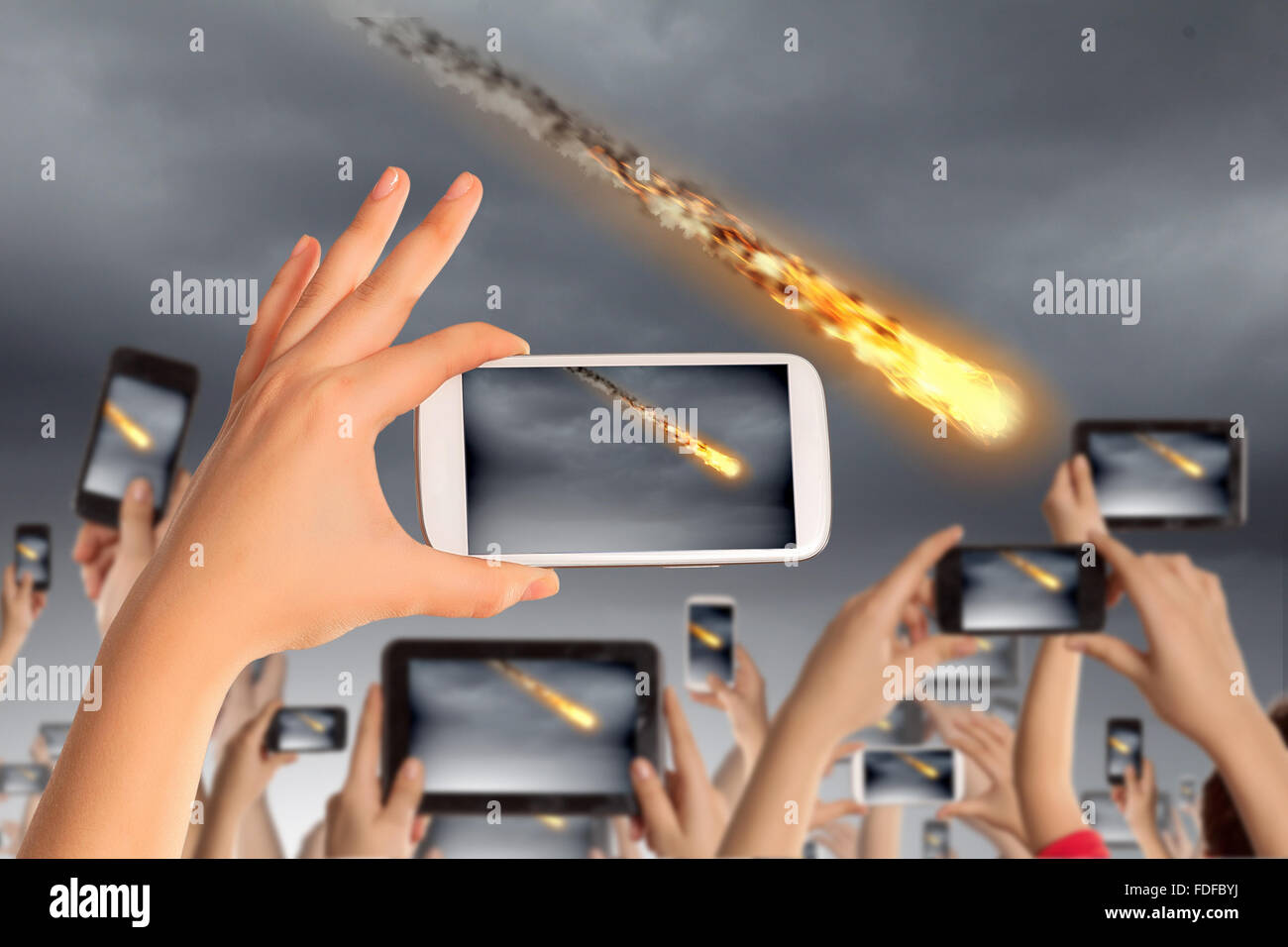 Close up of human hands taking photo of falling meteorite Stock Photo ...