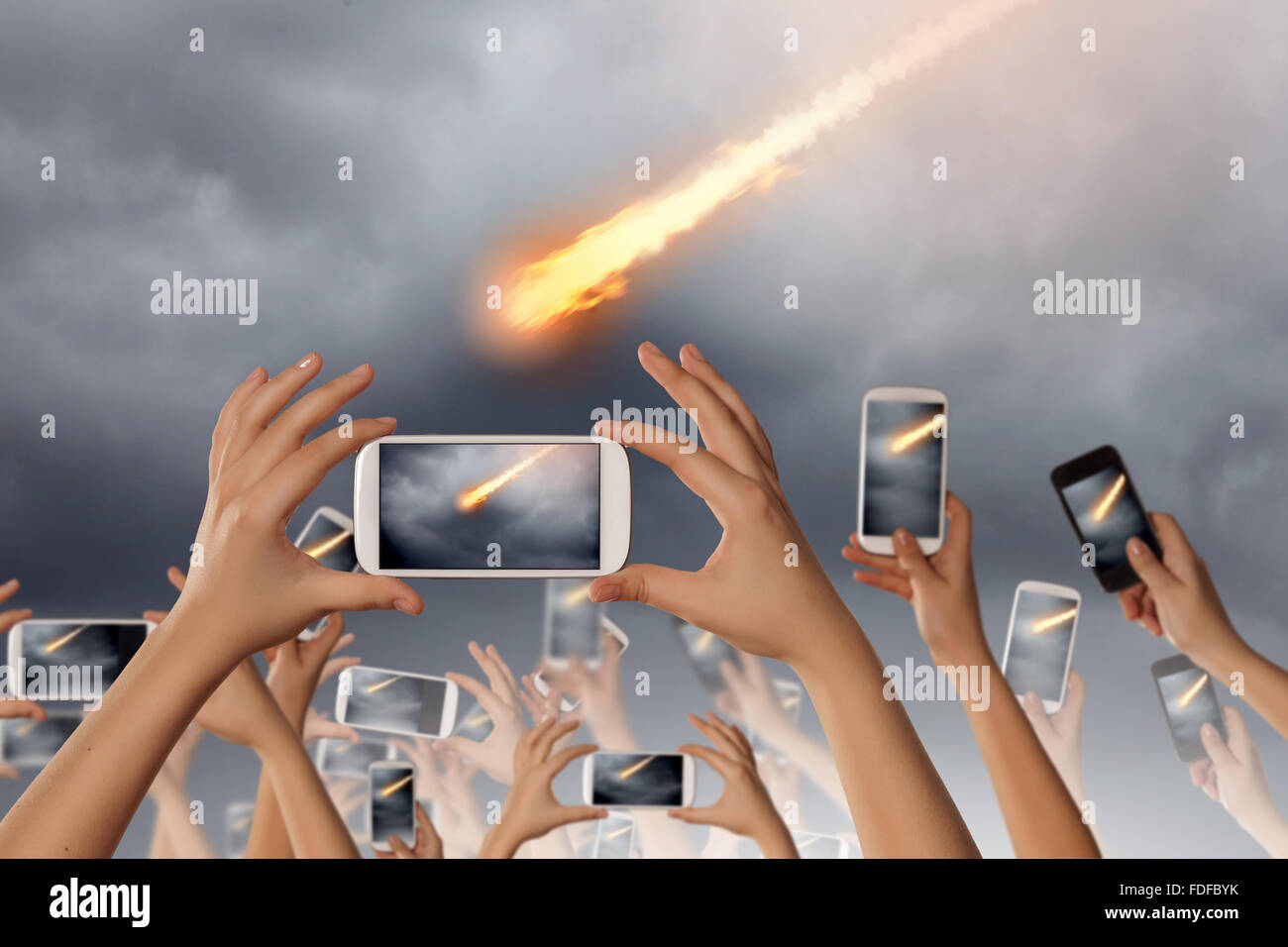 Close up of human hands taking photo of falling meteorite Stock Photo ...