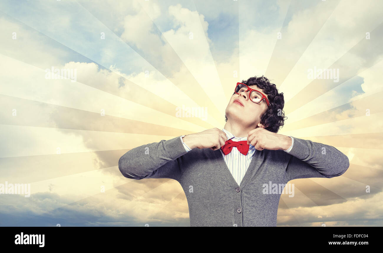Image of young man in red glasses Stock Photo - Alamy