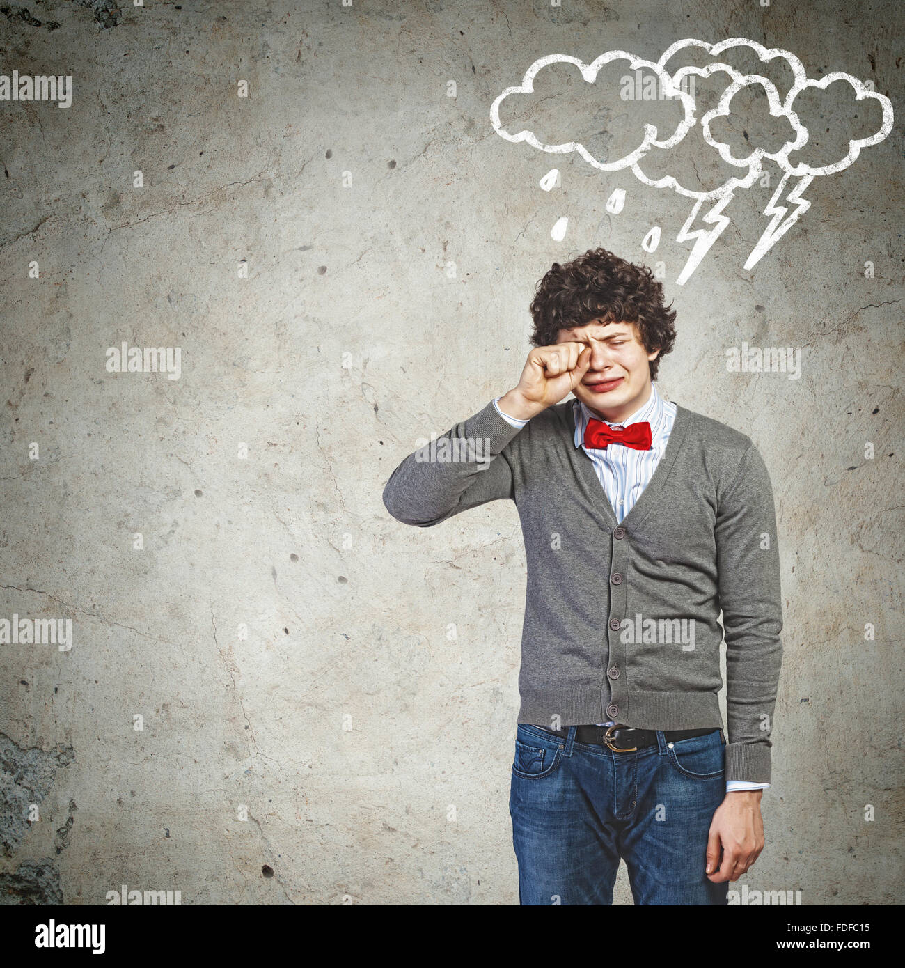 Image of young upset man in red tie crying Stock Photo - Alamy