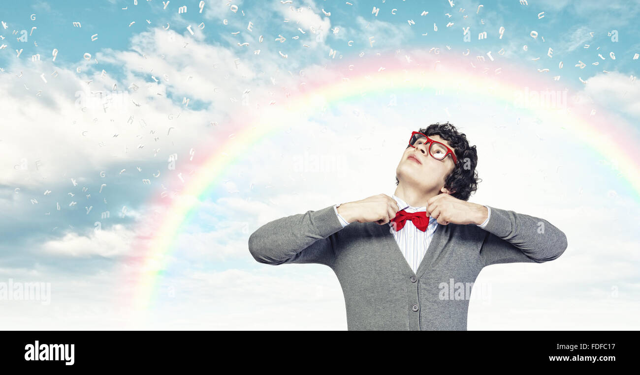 Image of young man in red glasses Stock Photo - Alamy