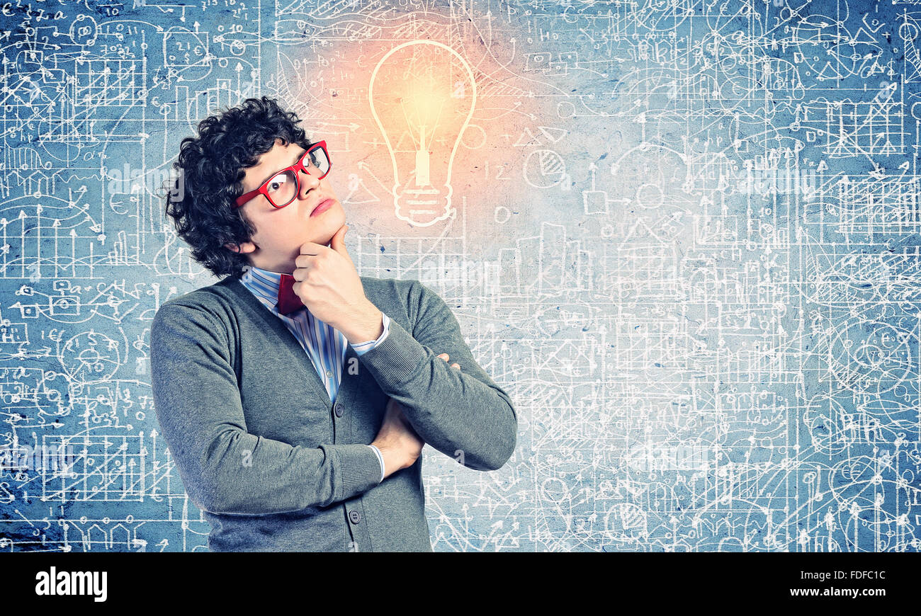 Young man in the process of thinking and finding a solution Stock Photo ...