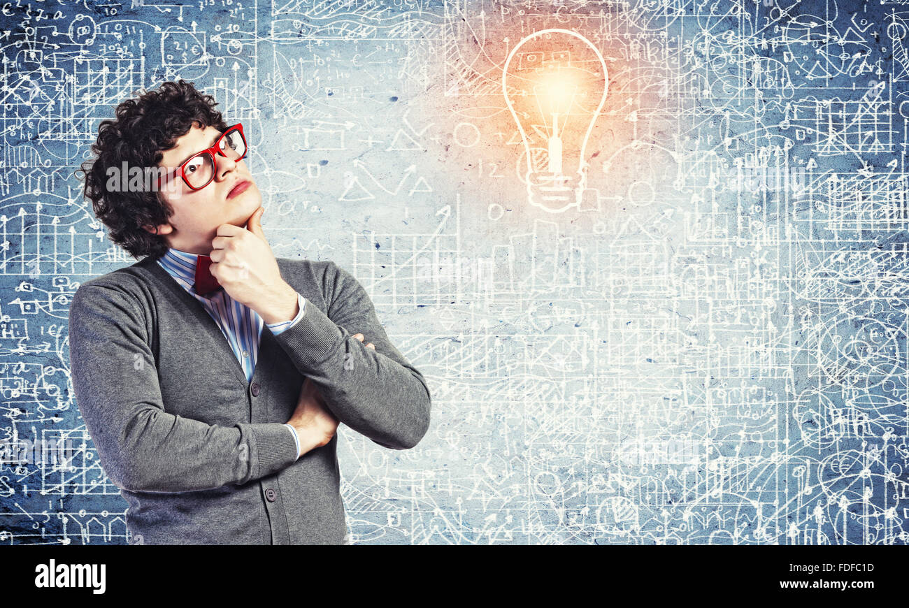 Young man in the process of thinking and finding a solution Stock Photo ...