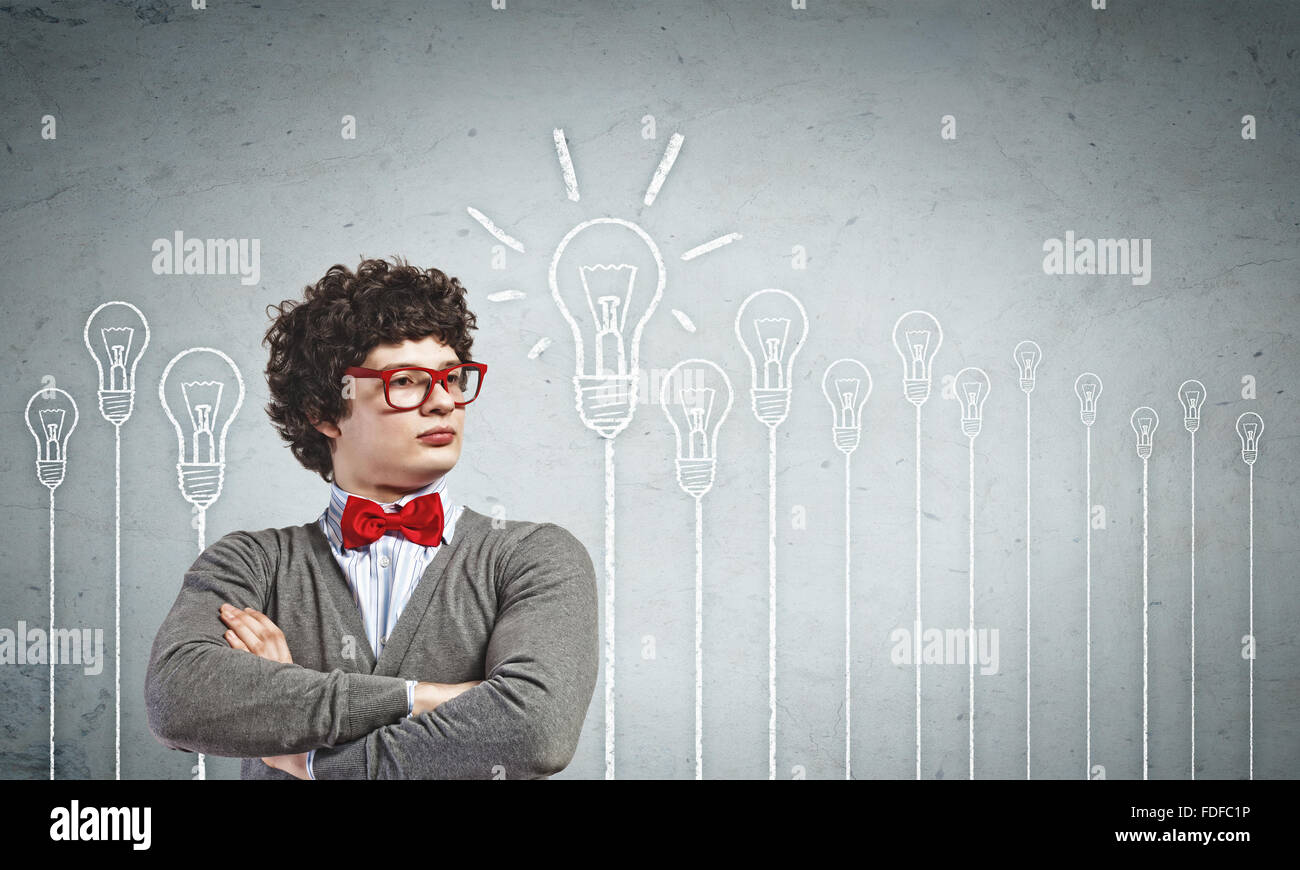 Young man in the process of thinking and finding a solution Stock Photo ...