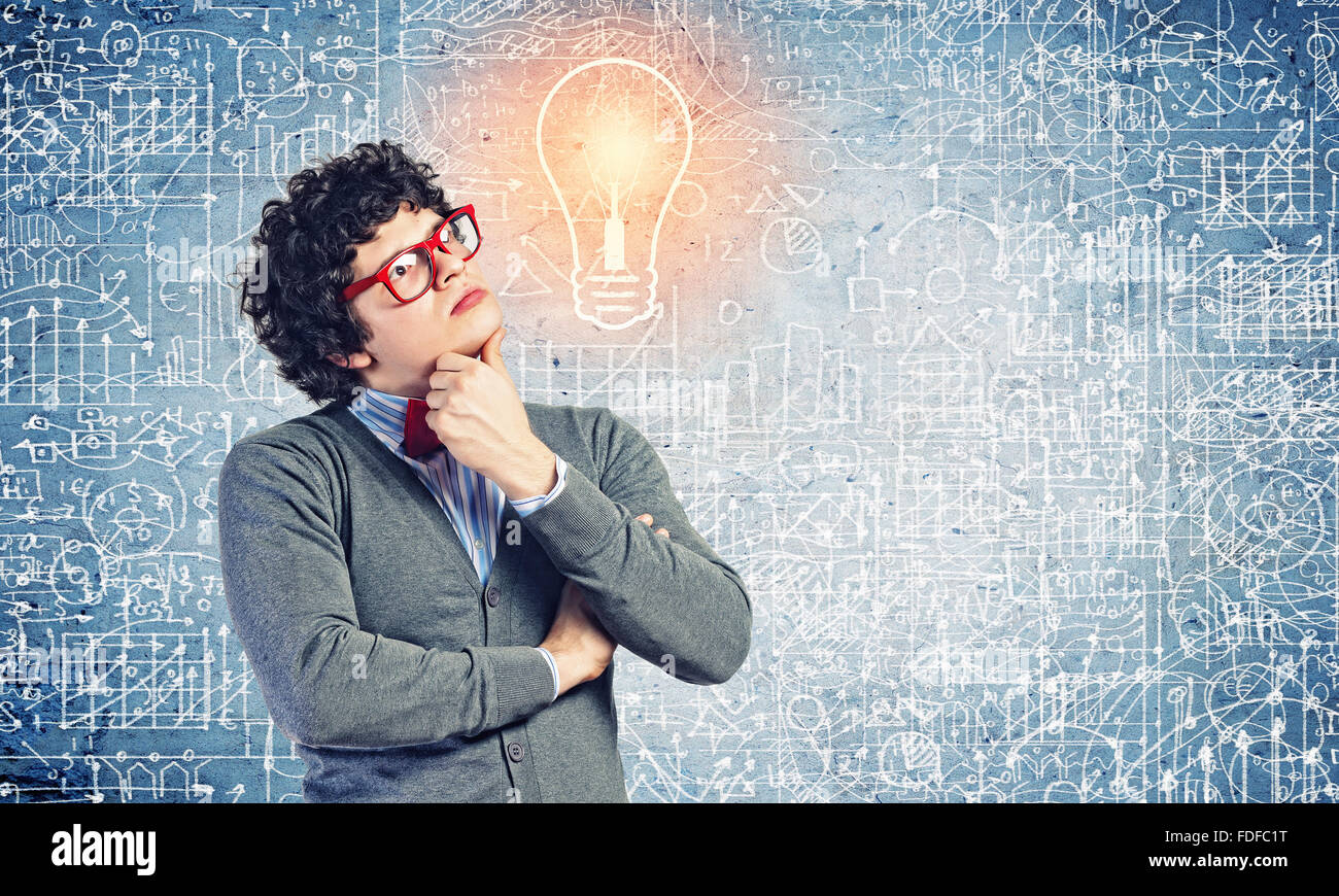 Young man in the process of thinking and finding a solution Stock Photo ...