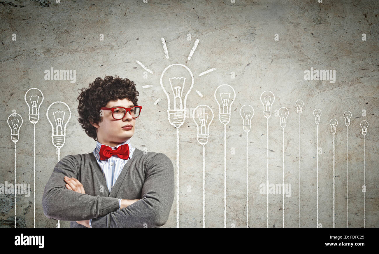 Young man in the process of thinking and finding a solution Stock Photo ...