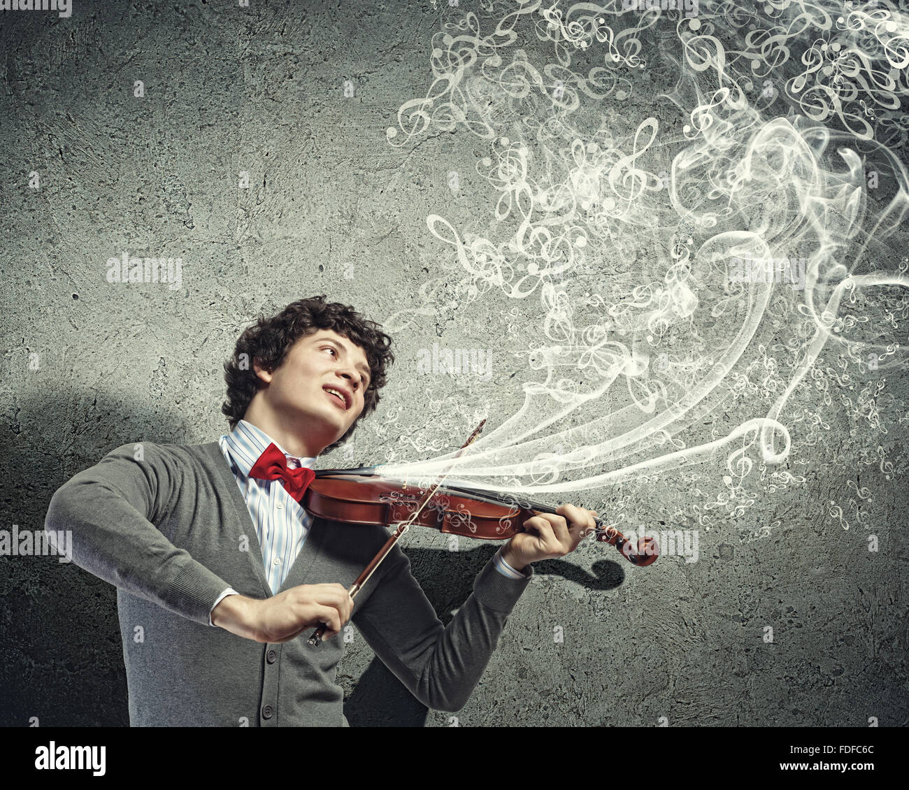 Image of young handsome man playing violin Stock Photo - Alamy
