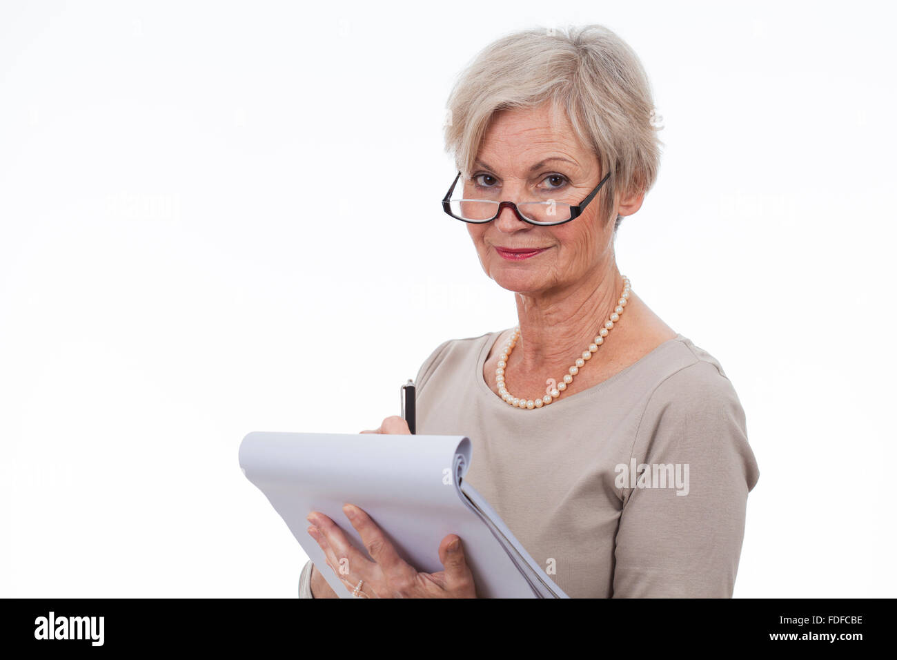 beautiful happy smiling older senior women holding sign with text space ...