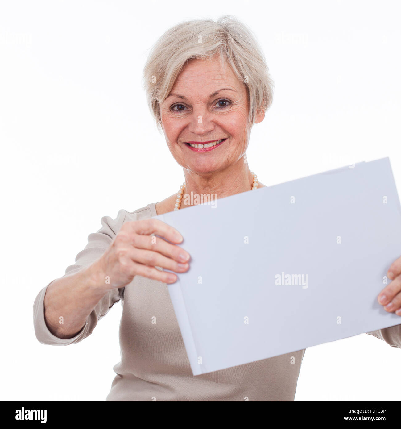 beautiful happy smiling older senior women holding sign with text space ...