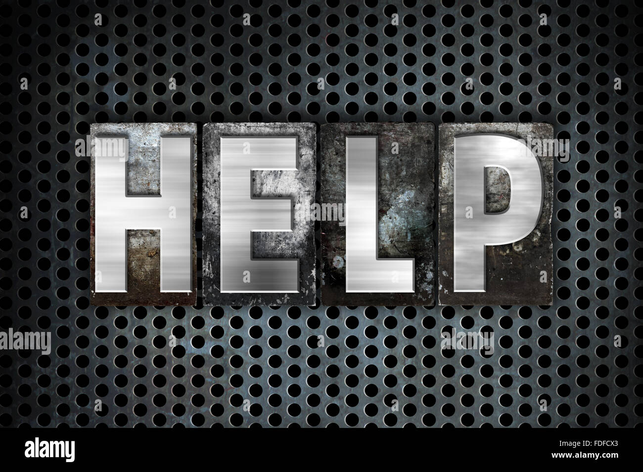 The word "Help" written in vintage metal letterpress type on a black ...