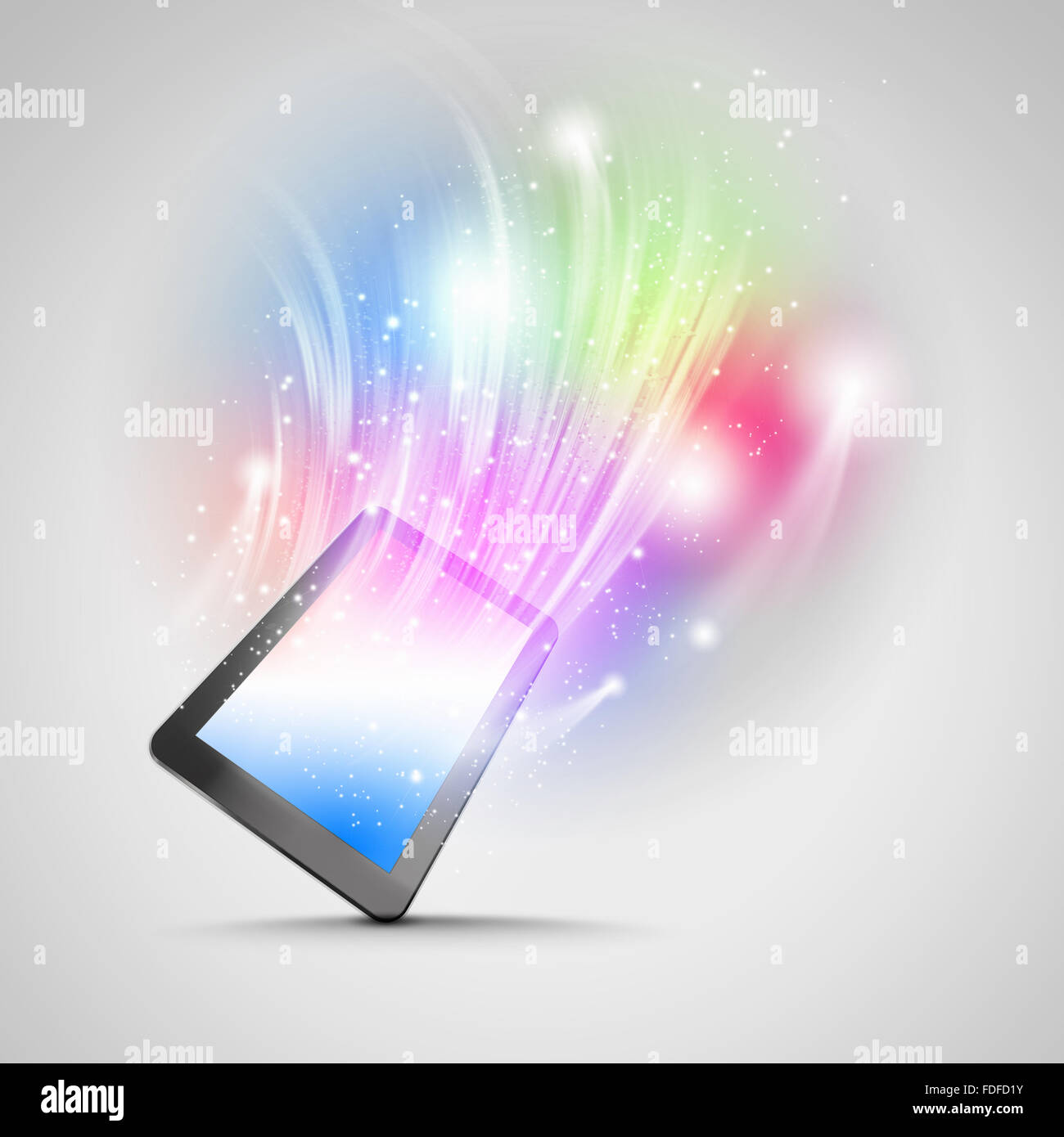 Image of tablet pc with color lights and splashes Stock Photo - Alamy