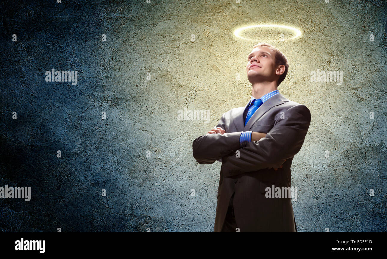 Image of businessman with halo above head Stock Photo - Alamy