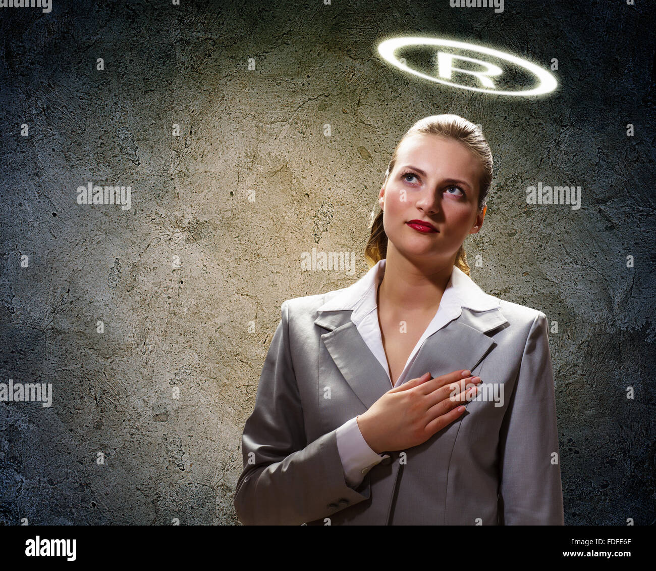 Image of businesswoman with halo above head Stock Photo - Alamy