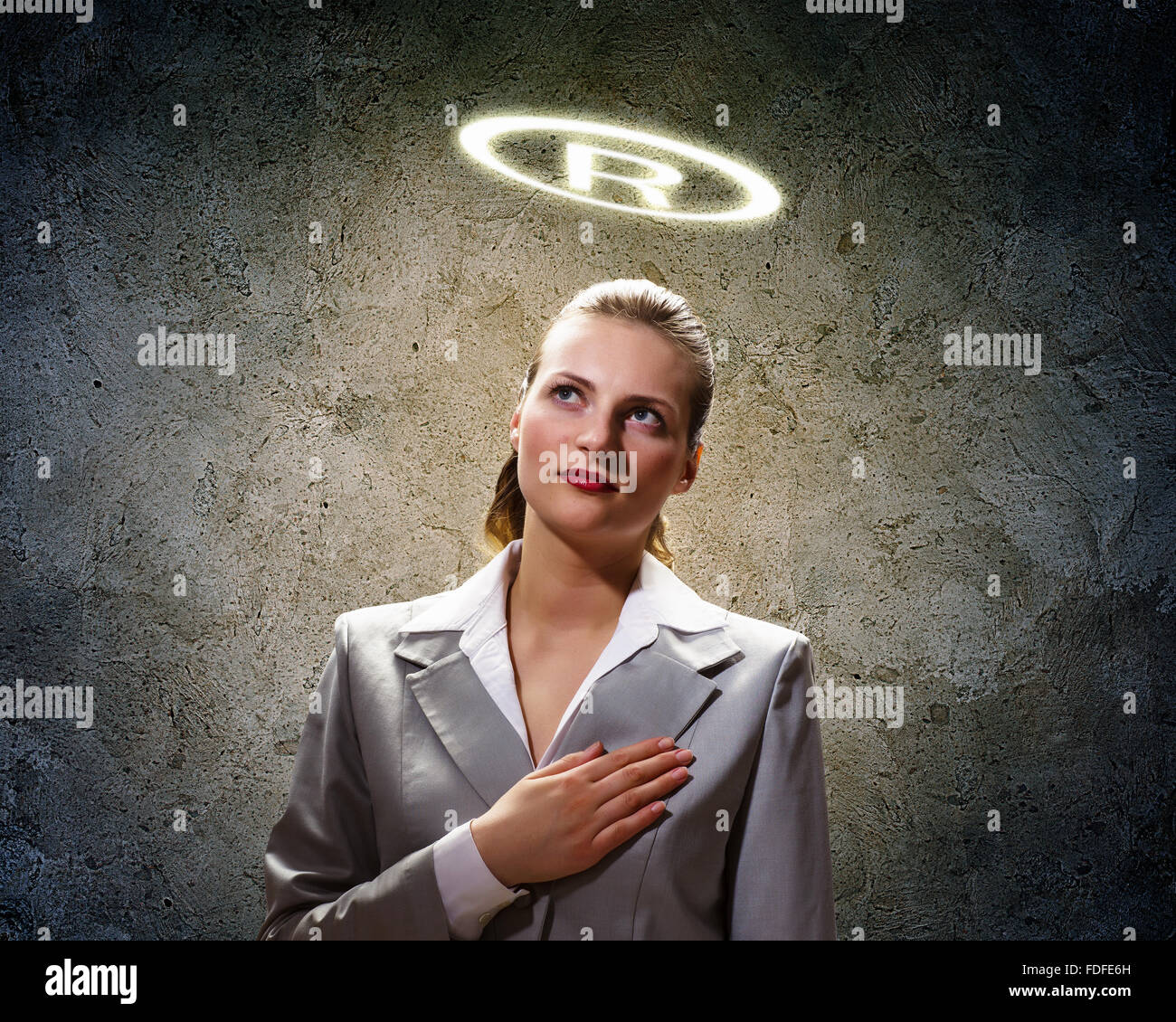 Image of businesswoman with halo above head Stock Photo - Alamy