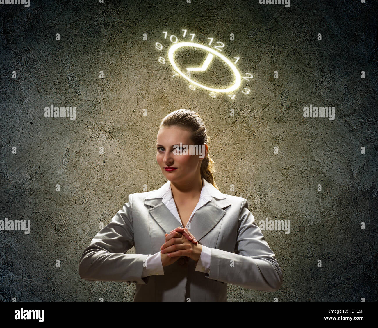 Image of businesswoman with halo above head Stock Photo - Alamy