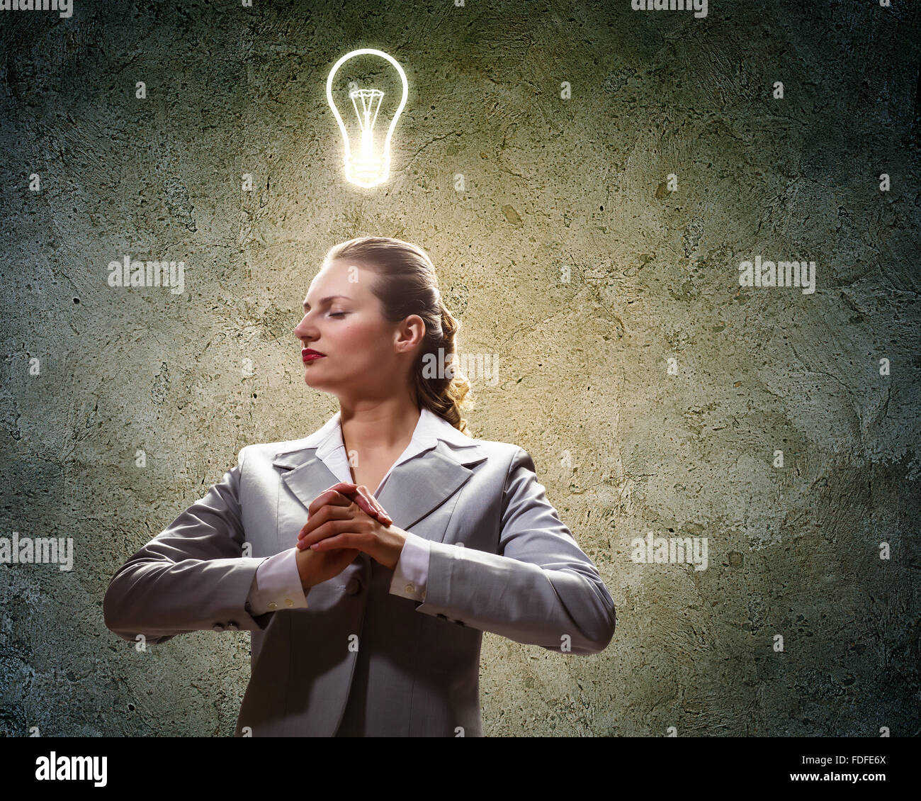 Image of businesswoman with halo above head Stock Photo - Alamy
