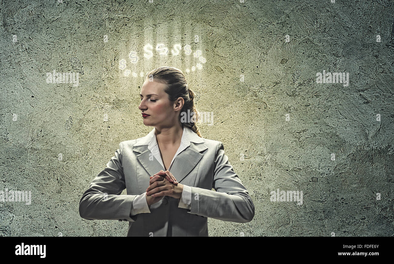 Image of businesswoman with halo above head Stock Photo - Alamy
