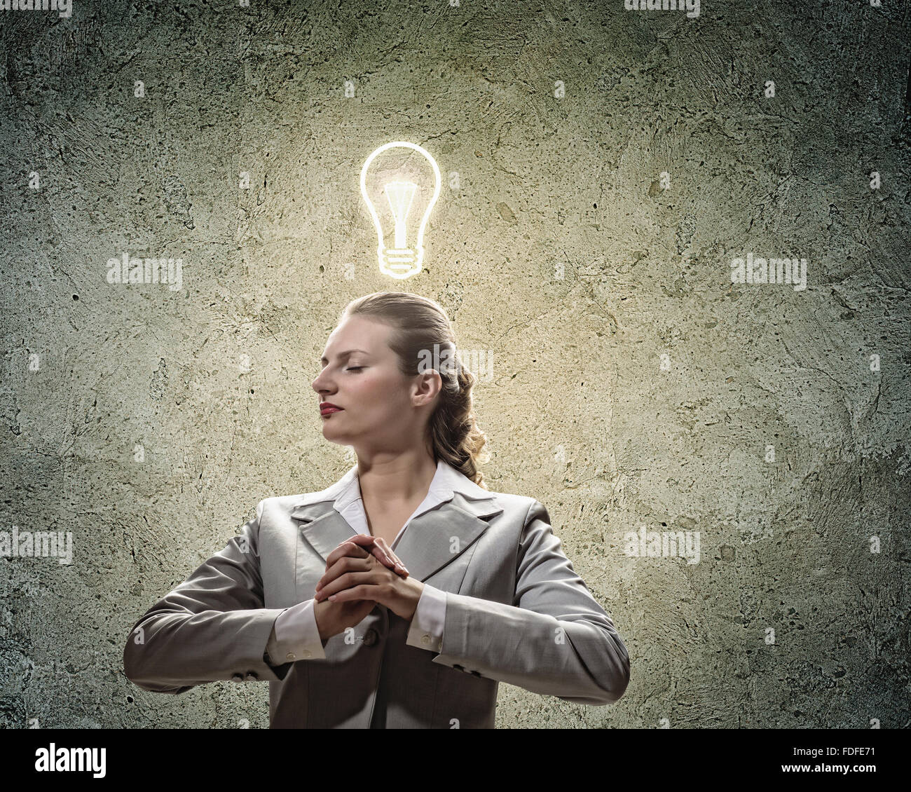Image of businesswoman with halo above head Stock Photo - Alamy