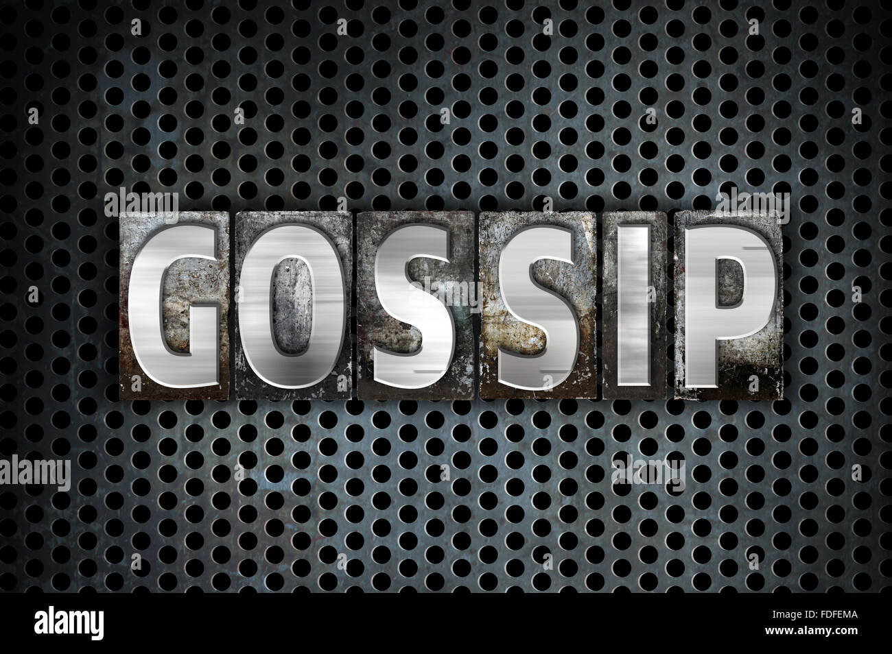The word "Gossip" written in vintage metal letterpress type on a black ...