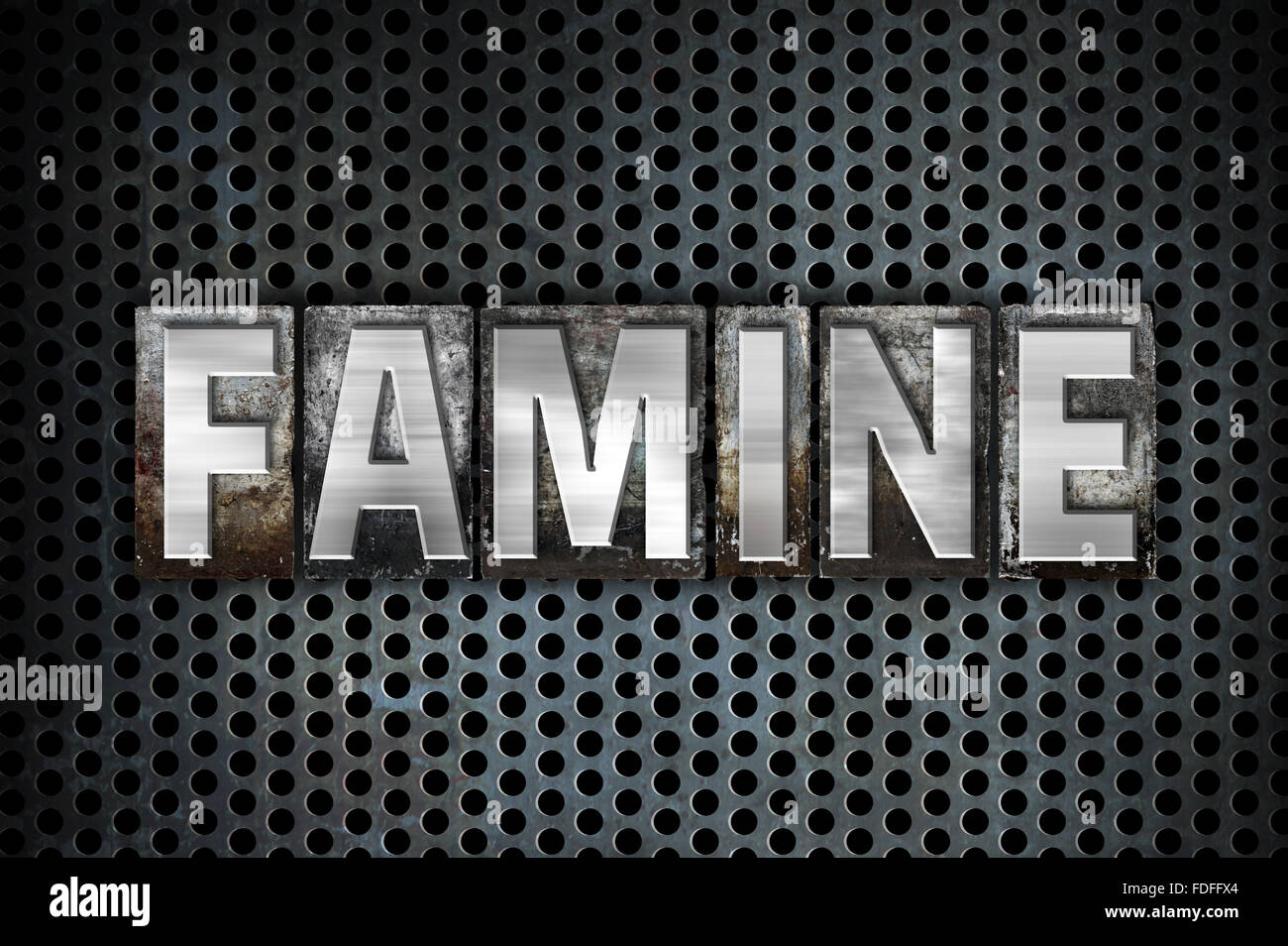 The word "Famine" written in vintage metal letterpress type on a black ...