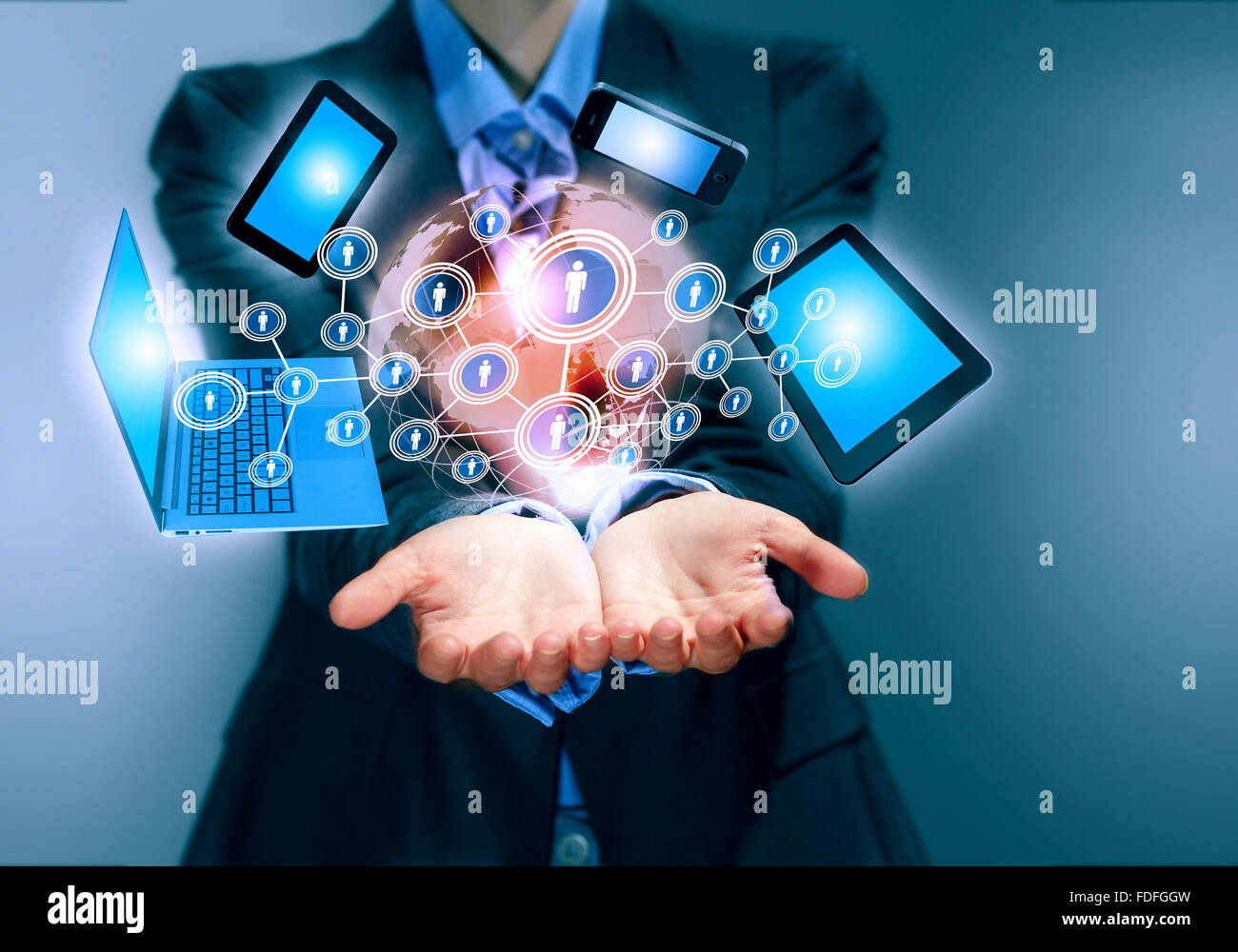 Image of business person holding devices in hands Stock Photo - Alamy