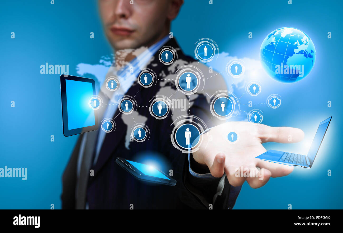 Image of business person holding devices in hands Stock Photo - Alamy