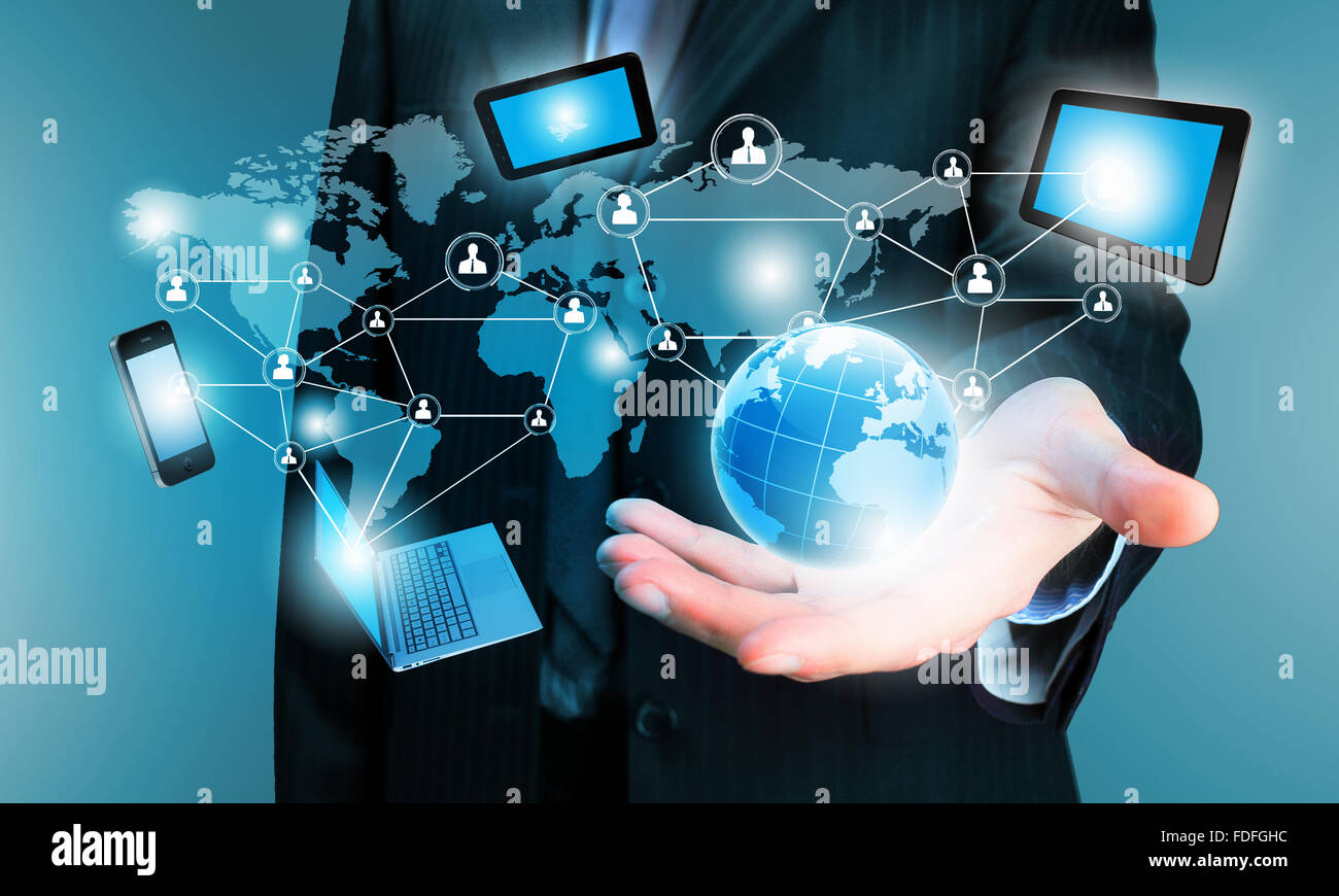 Image of business person holding devices in hands Stock Photo - Alamy