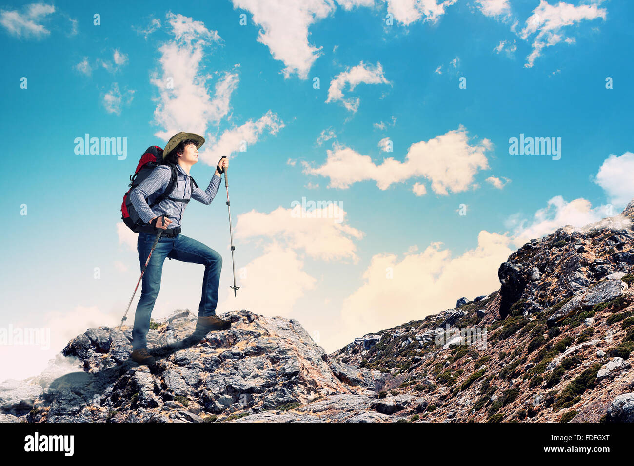 Man atop mountain hi-res stock photography and images - Alamy