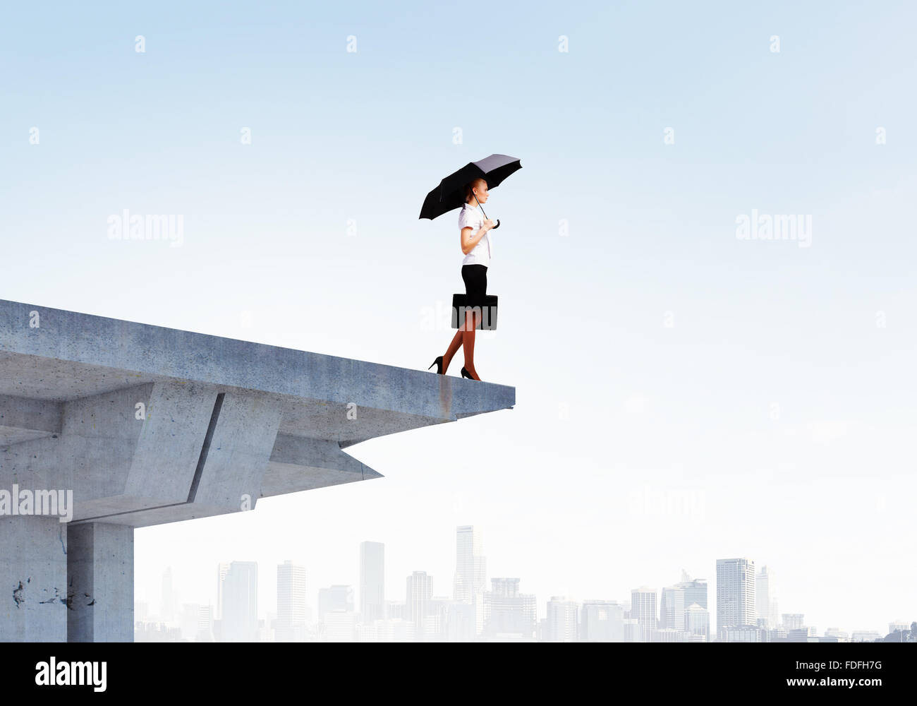 Image of businesswoman standing at the edge of bridge. Risk concept ...