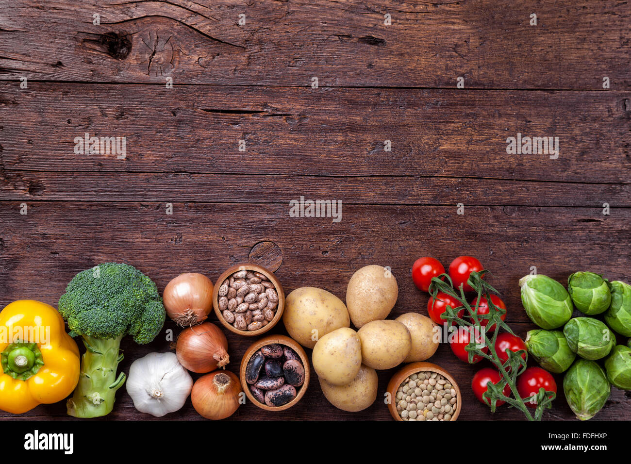 Fresh and healthy organic vegetables and food ingredients on wooden ...