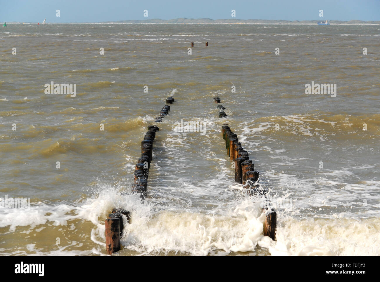 wave breaker at the Dutch coast during high tide Stock Photo - Alamy