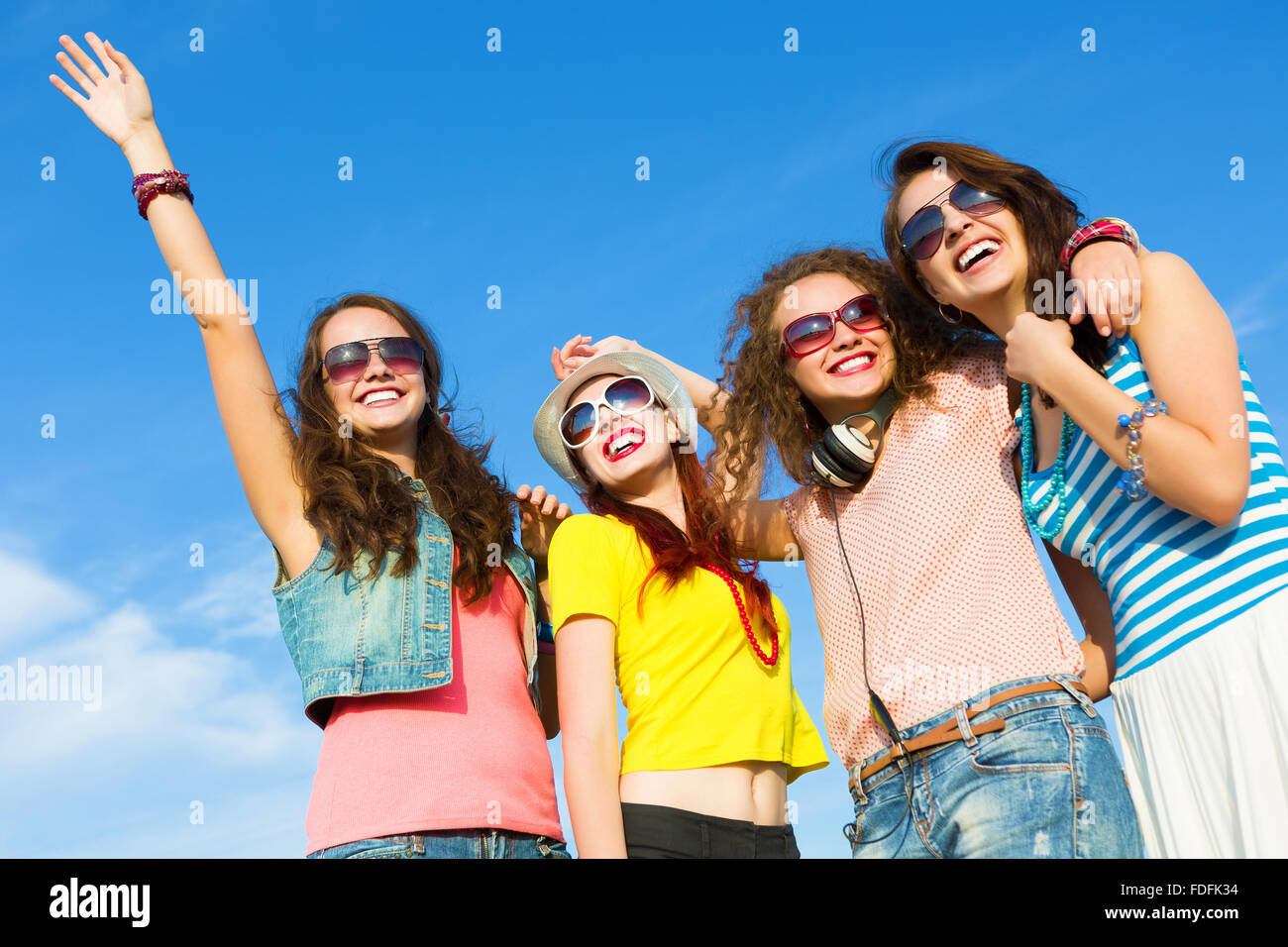 Image of four young attractive girls having fun outdoors Stock Photo ...