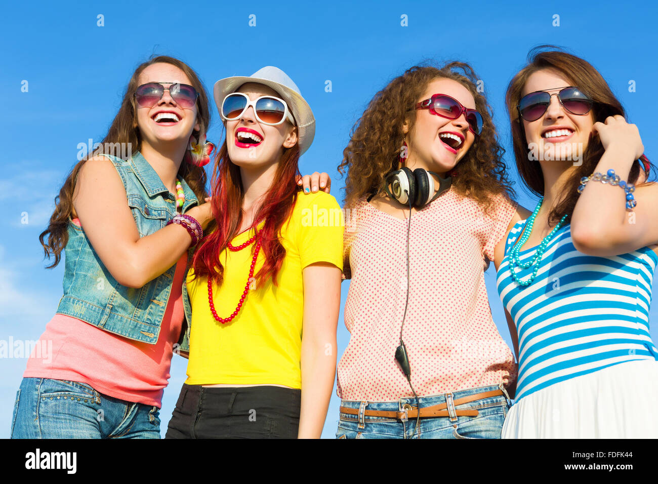 Image of four young attractive girls having fun outdoors Stock Photo ...