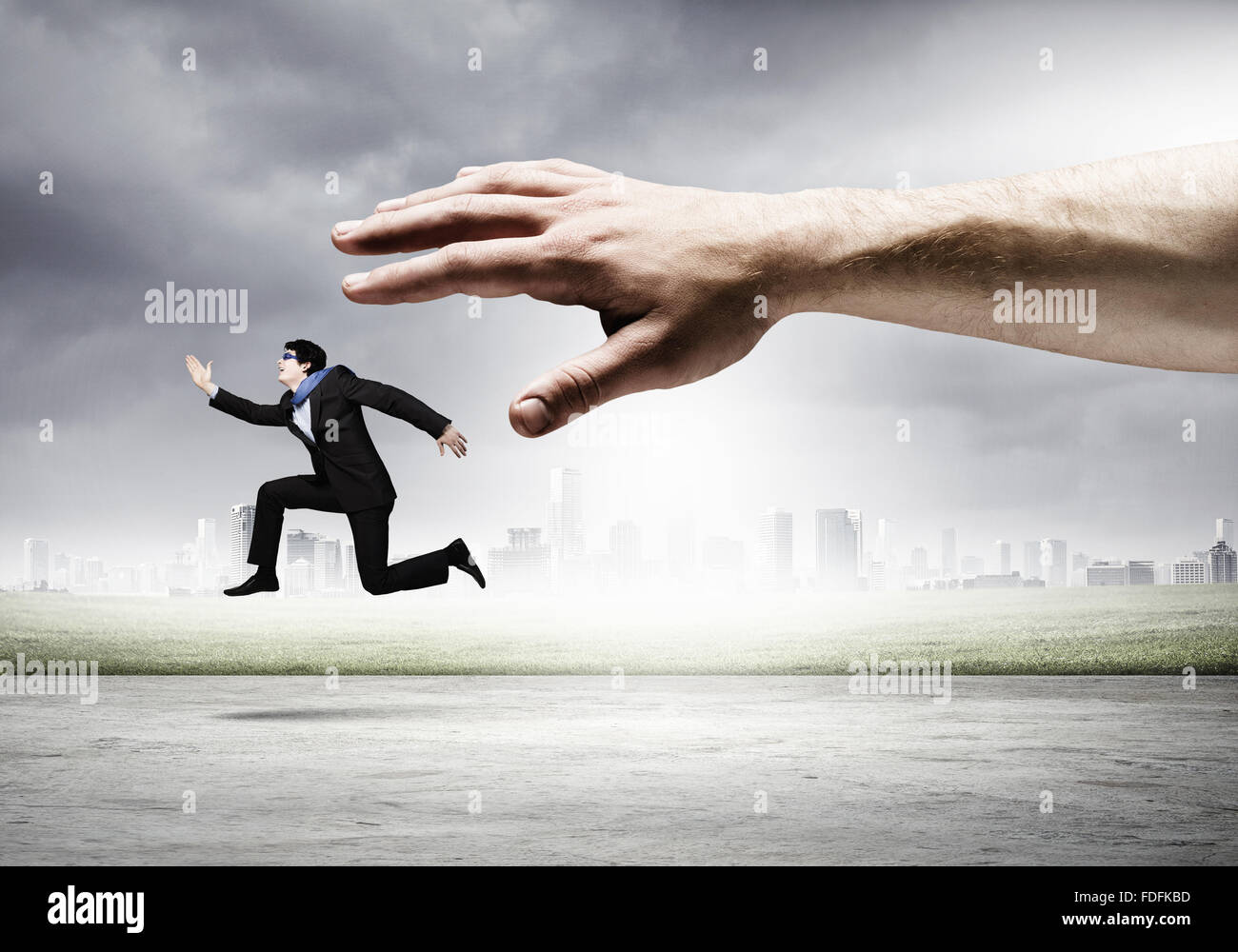 Big human hand catching businessman. Professional relations Stock Photo ...