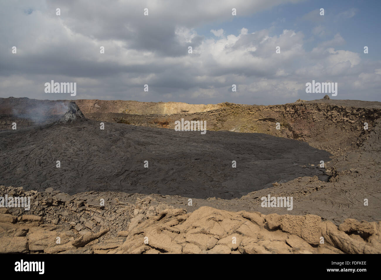 A steaming Hornito lies at the center of a sunken crater inside the ...