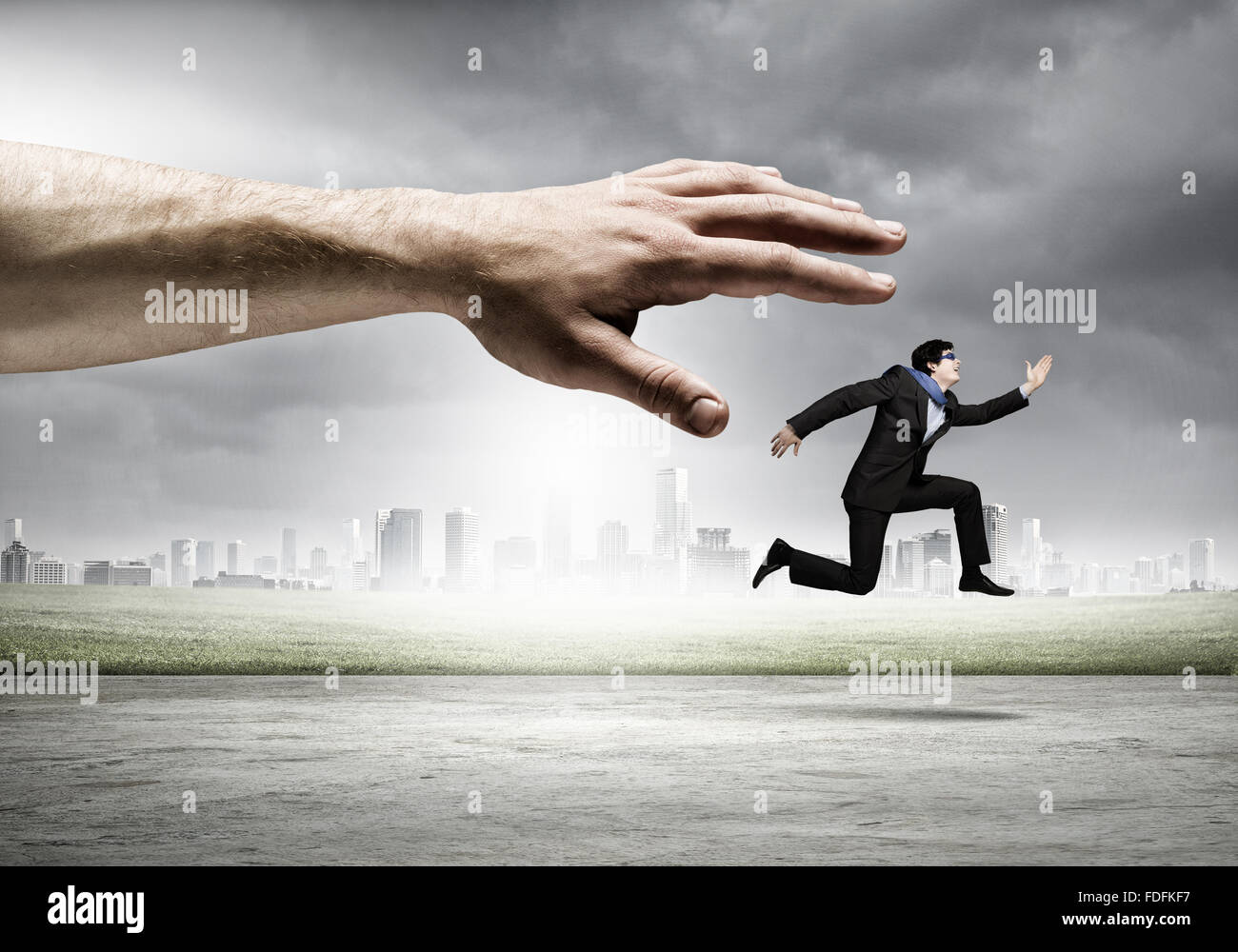 Big human hand catching businessman. Professional relations Stock Photo ...