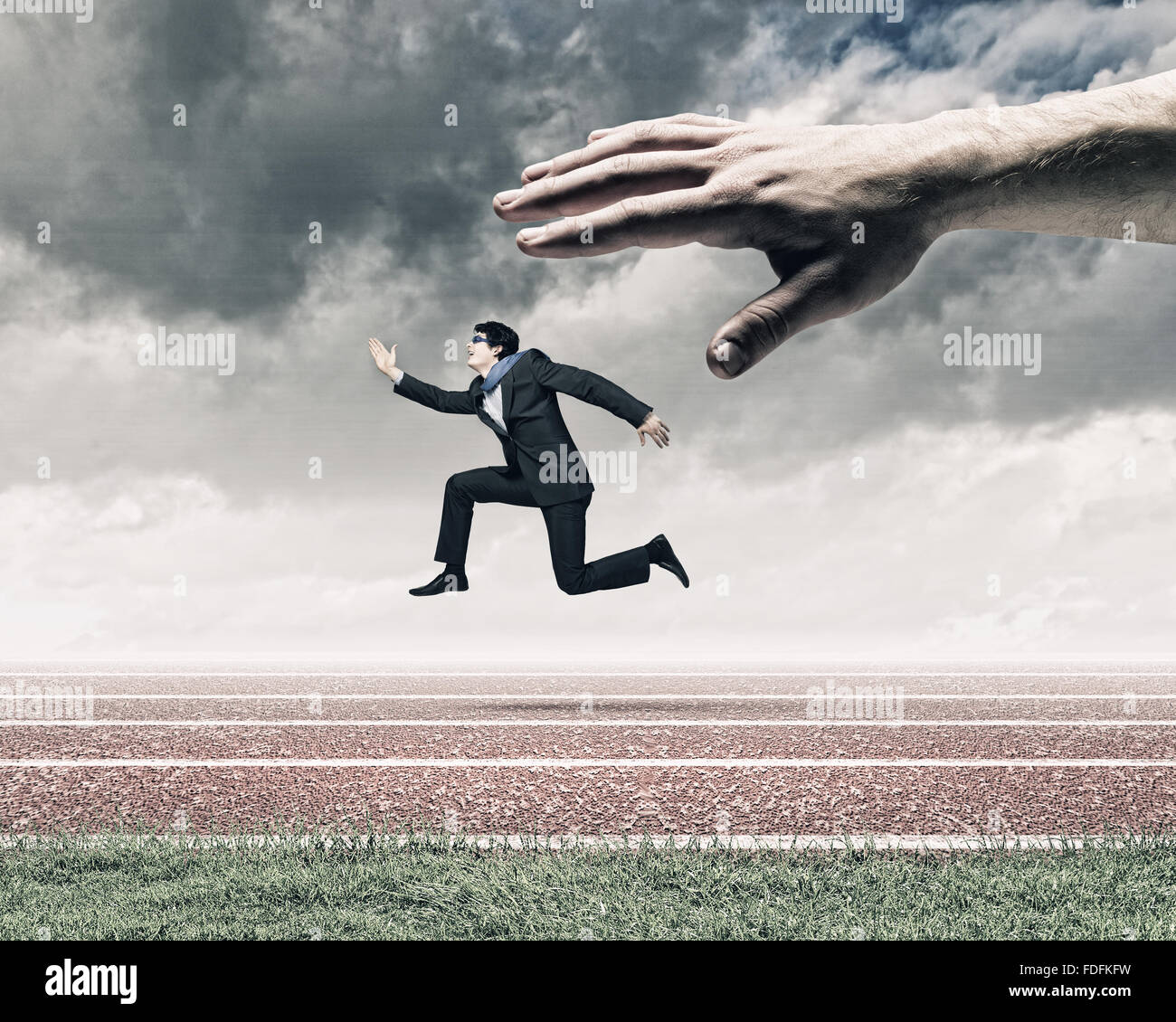 Big human hand catching businessman. Professional relations Stock Photo ...