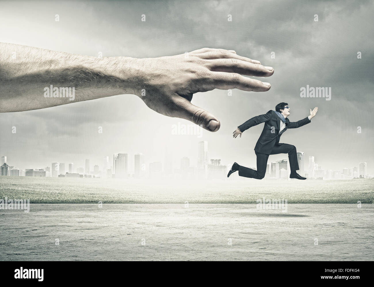 Big human hand catching businessman. Professional relations Stock Photo ...