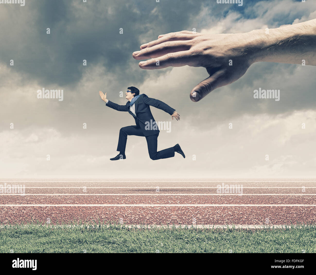 Big human hand catching businessman. Professional relations Stock Photo ...