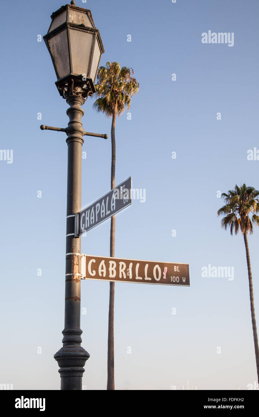 Signs on street lamp pole hi-res stock photography and images - Alamy
