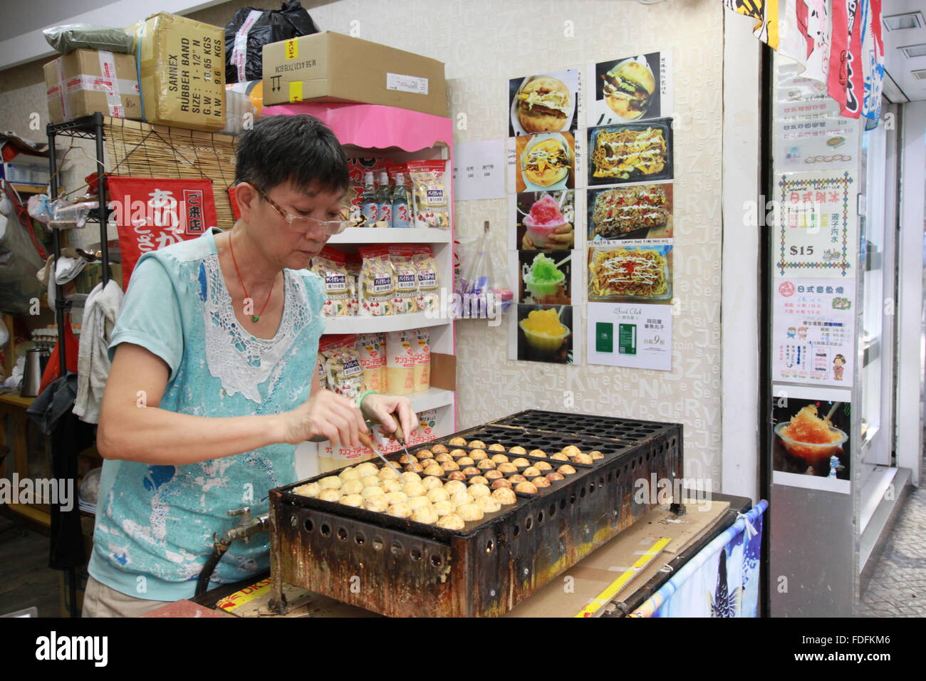 Woman in sweets shop hi-res stock photography and images - Alamy