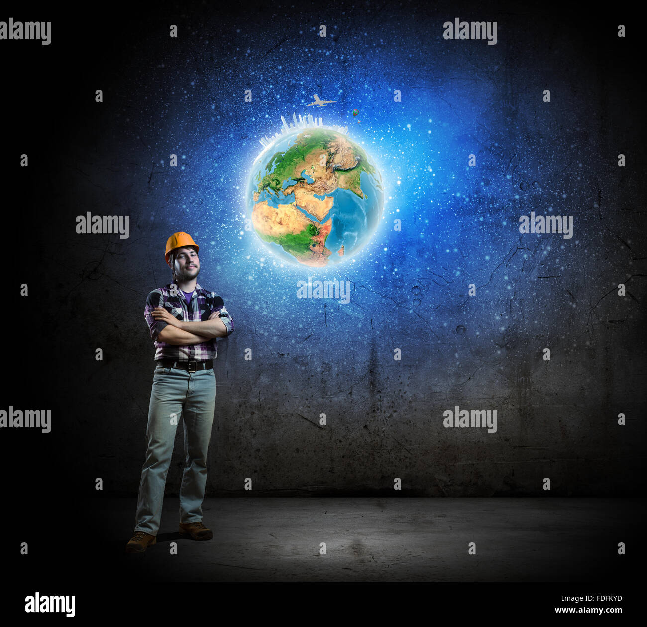 Image of man builder looking at planet Earth. Elements of this image ...