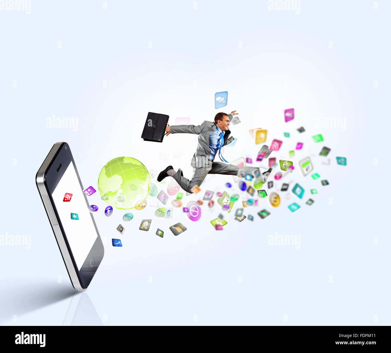 Image of businessman jumping out of mobile phone Stock Photo - Alamy