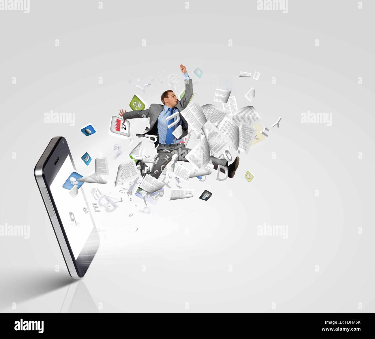 Image of businessman jumping out of mobile phone Stock Photo - Alamy