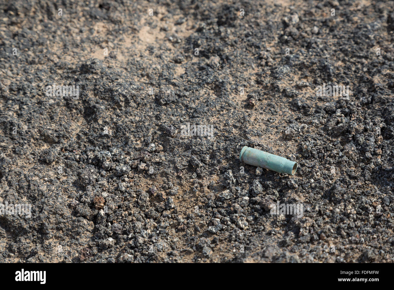A corroding bullet casing lies on the ash cone of Erta Ale volcano ...