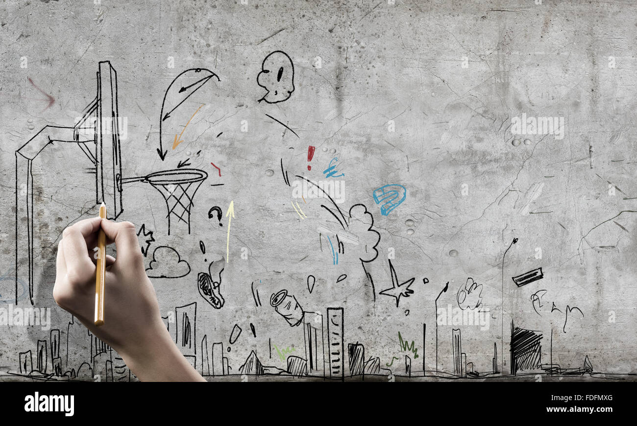 Close up of human hand drawing conceptual sketches Stock Photo - Alamy