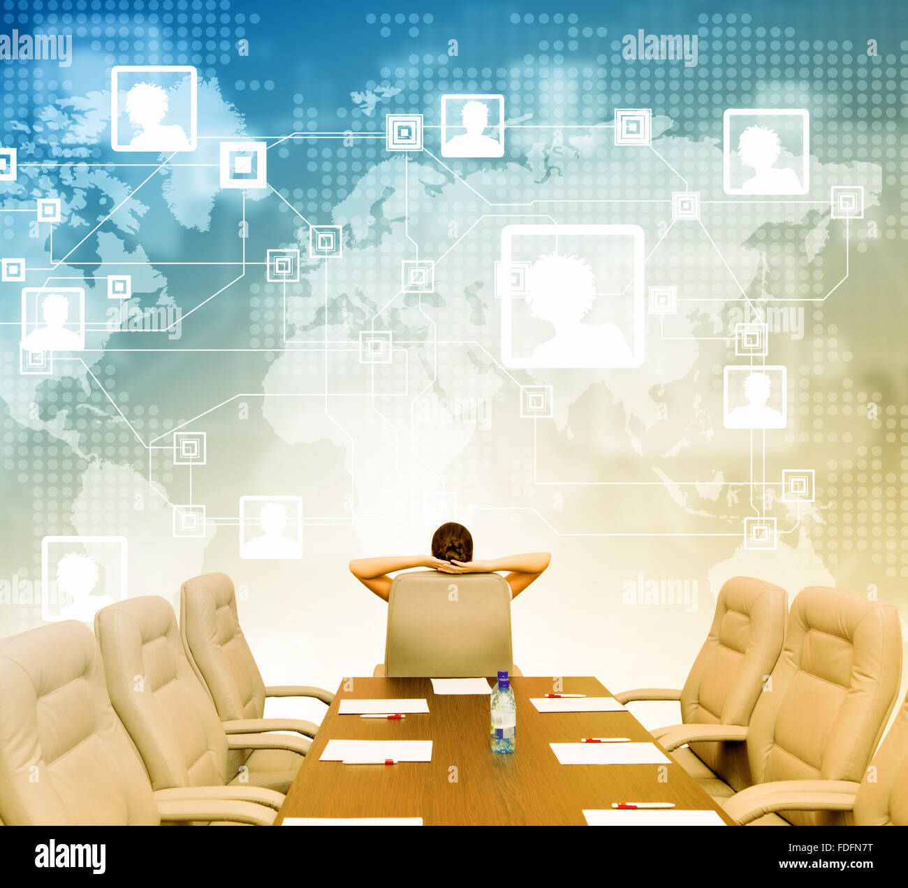 Businesswoman boss in conference room sitting with back in chair Stock ...