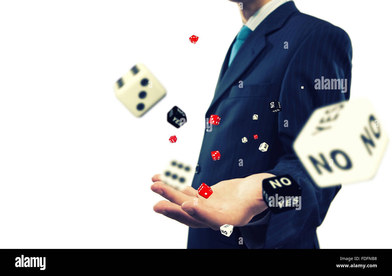Businessman throwing dice hi-res stock photography and images - Alamy