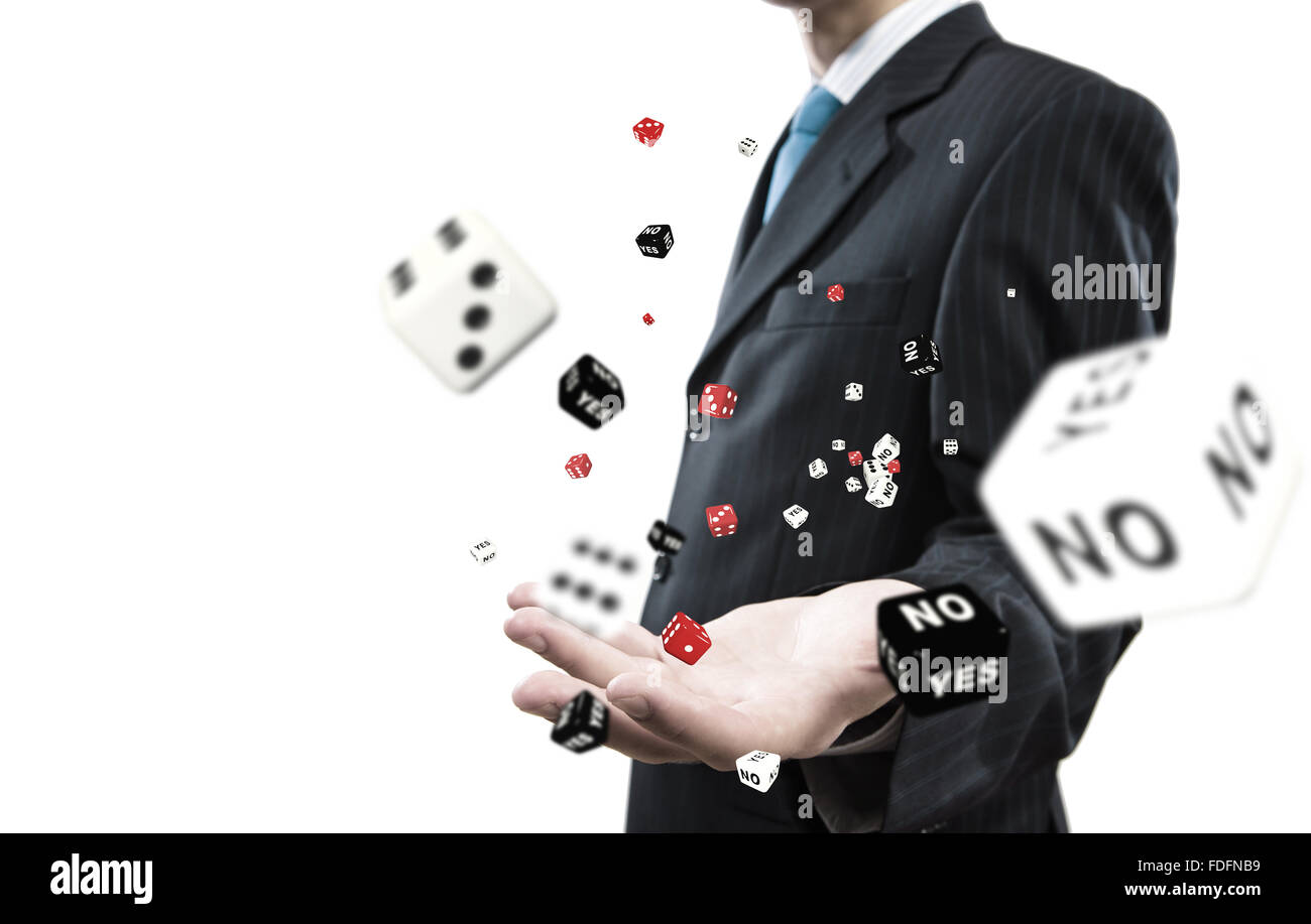 Close up of businessman throwing dice. Gambling concept Stock Photo - Alamy