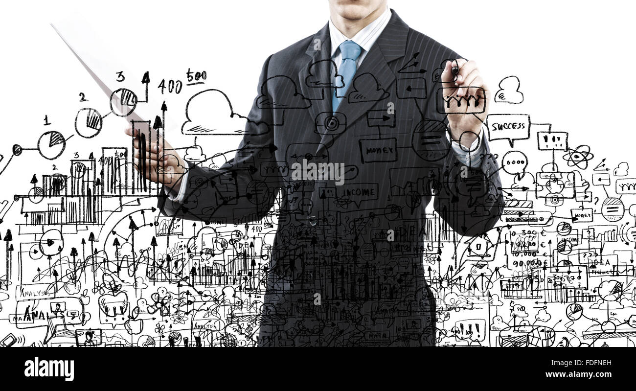 Close up of businessman with documents in hand drawing business ...